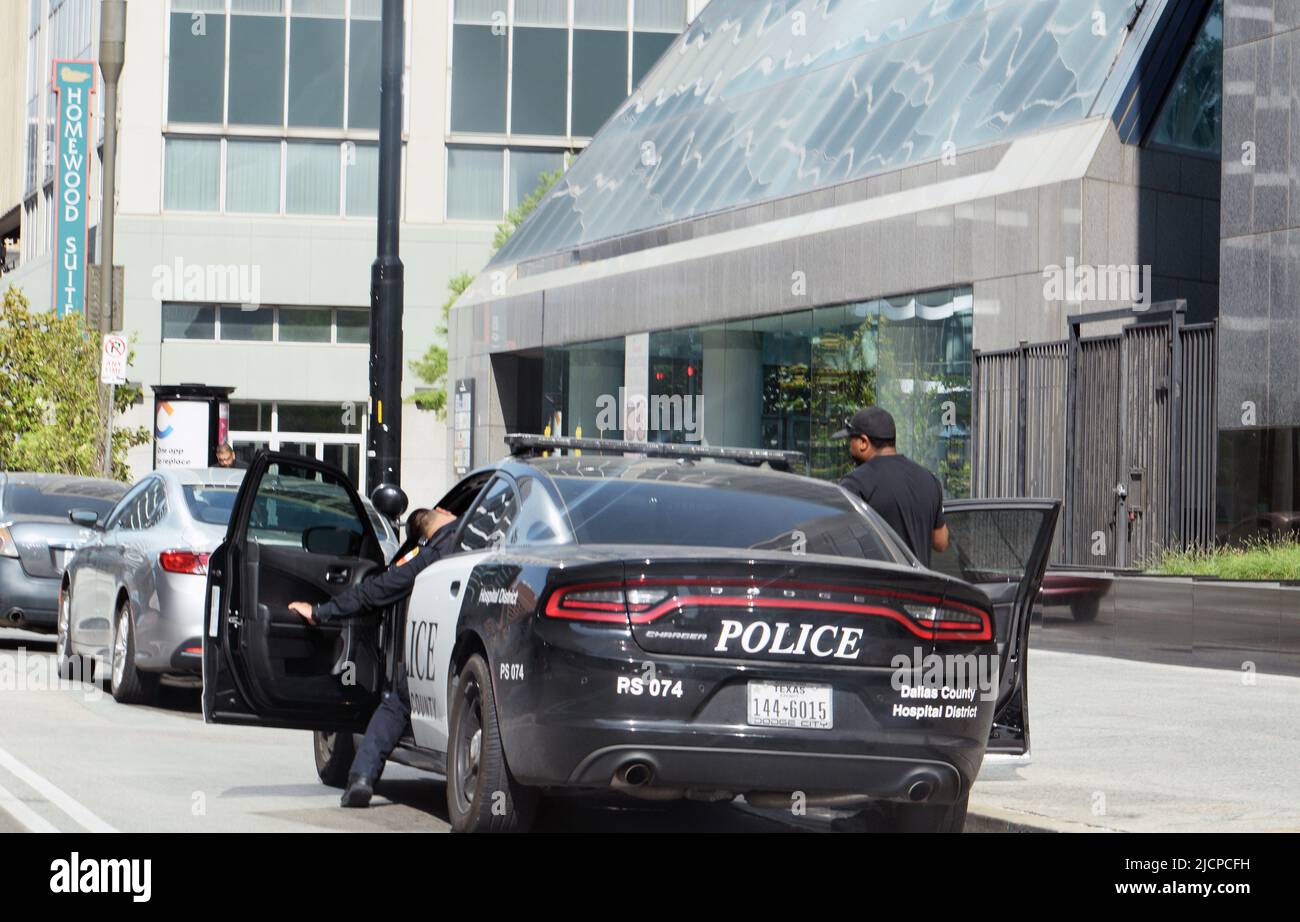 Two Dallas County Hospital District police officers getting into their ...