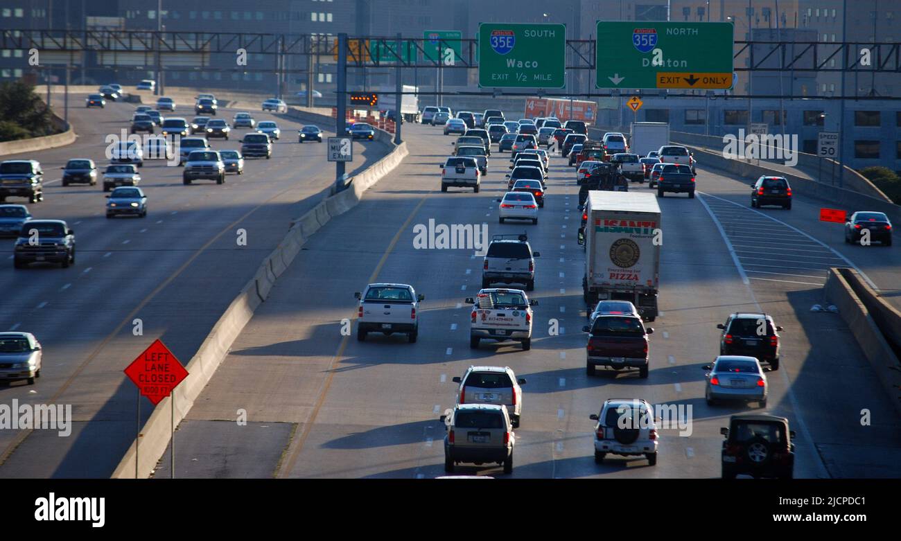 Automobile traffic in downtown Dallas Texas (Woodall Rogers Freeway ...