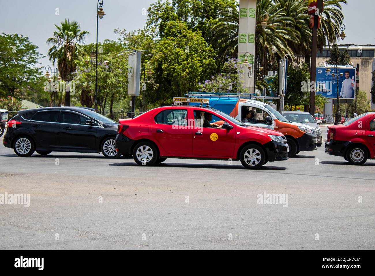 Fez, Morocco - June 14, 2022 Taxi driving through the streets of Fez ...