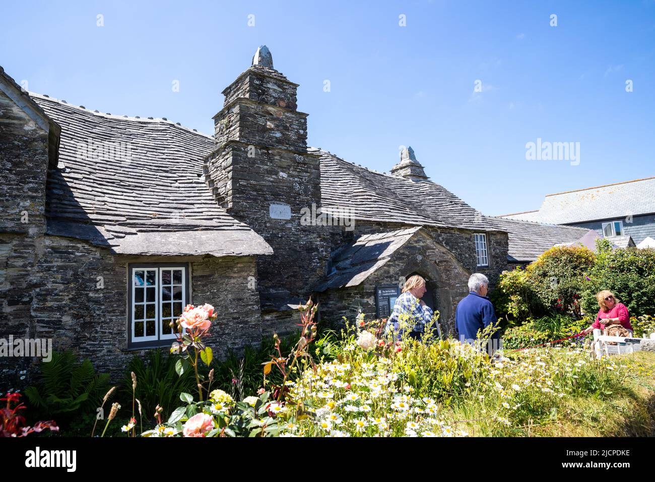 Blue sky over The Old Post Office in Tintagel, Cornwall on a Summer's ...