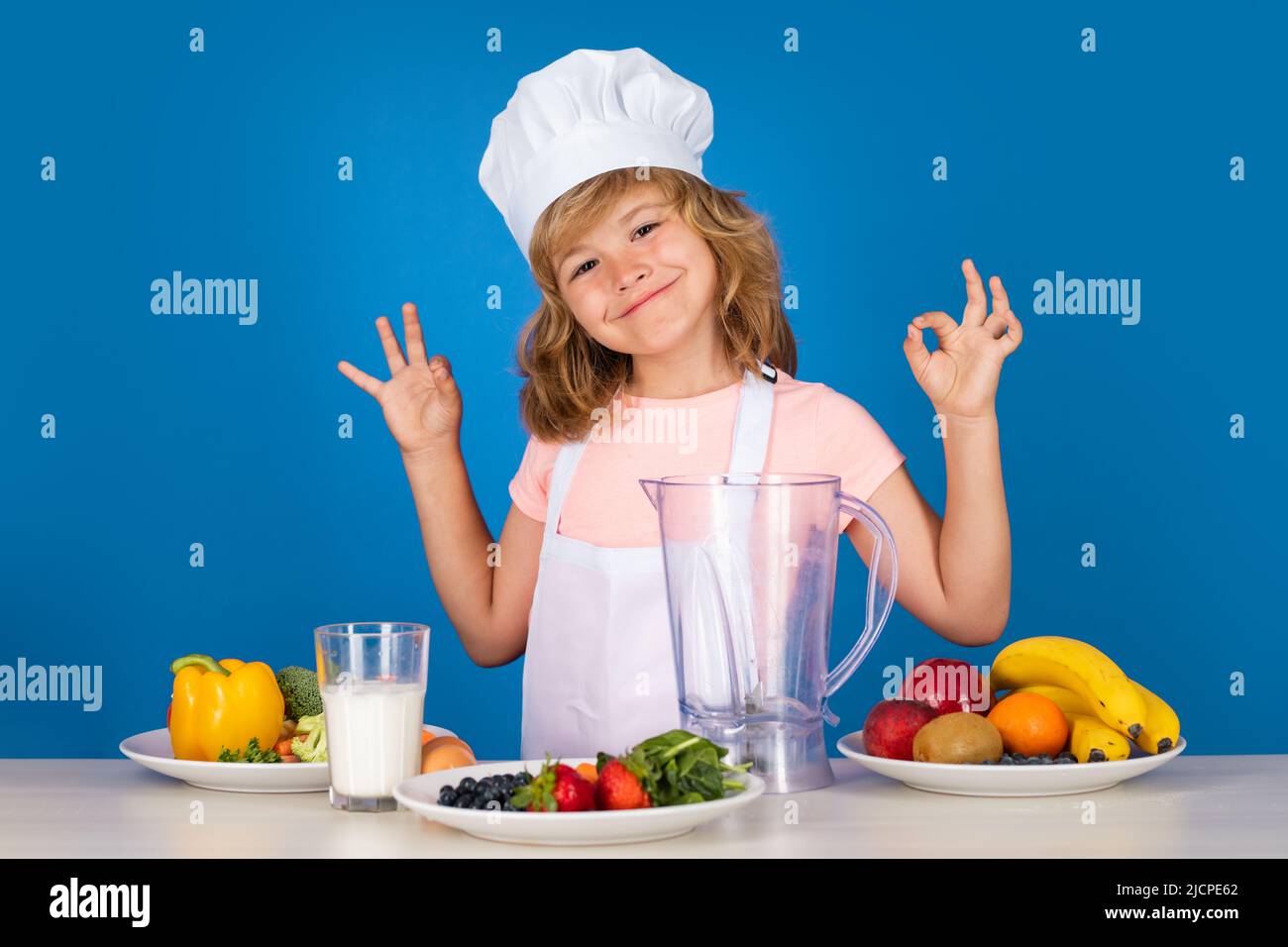 Portrait of chef child in cook hat. Cooking at home, kid boy preparing ...