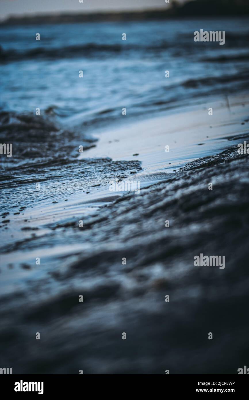Wave washing onto beach hi-res stock photography and images - Alamy
