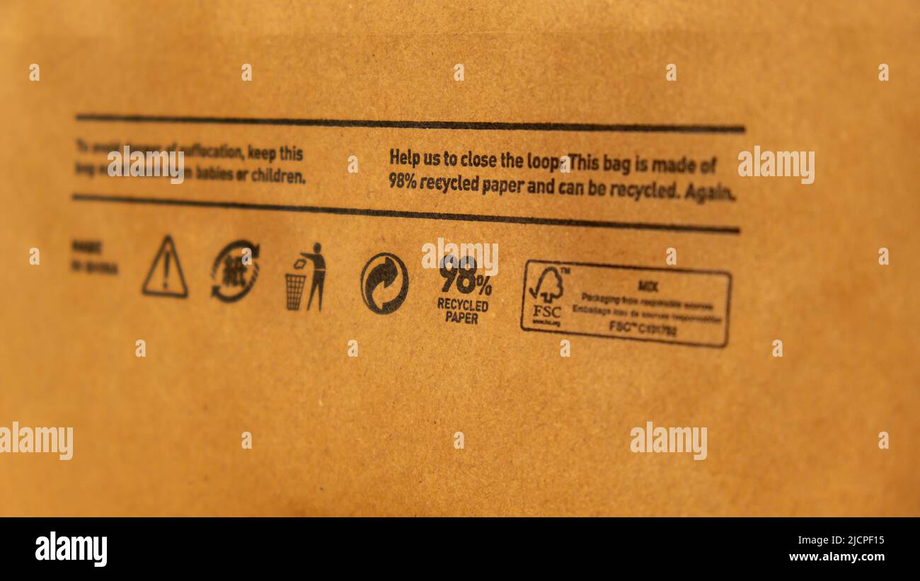 Recycling bag Closeup view of pap sign and other eco-label on Brown ...