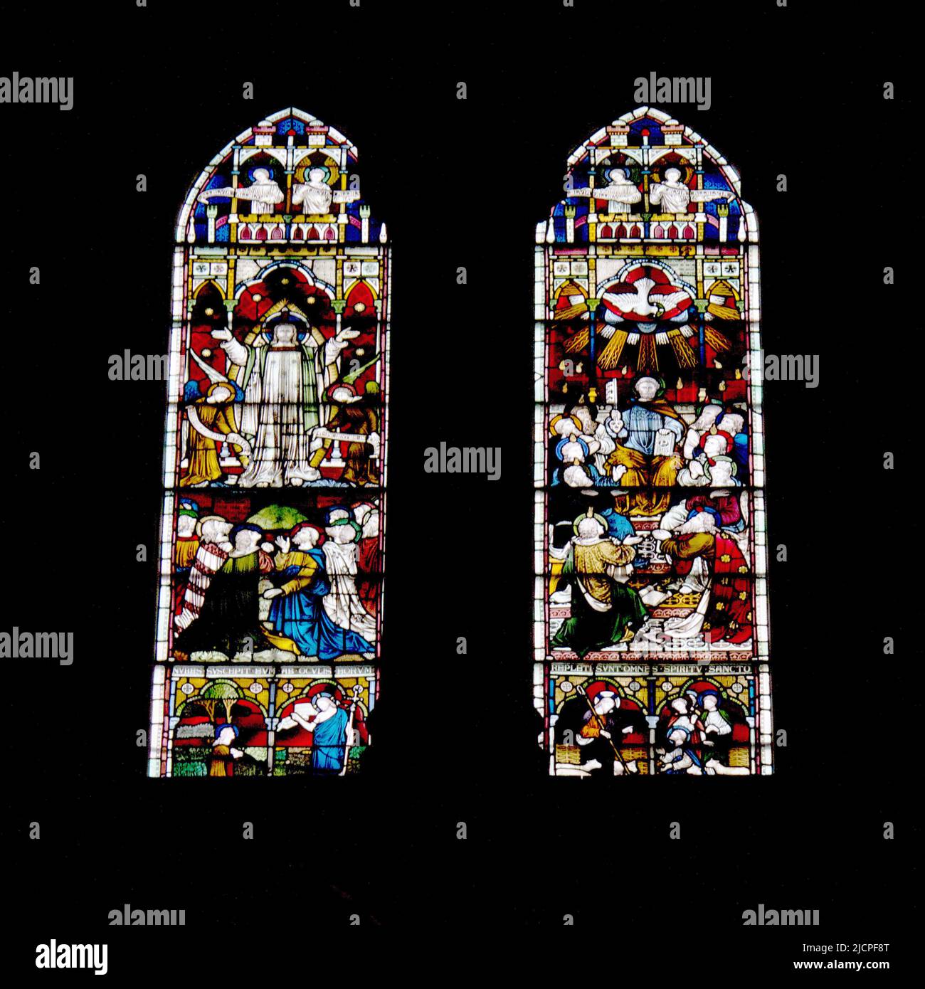 Light through stained glass rosettes, representing religious images ...