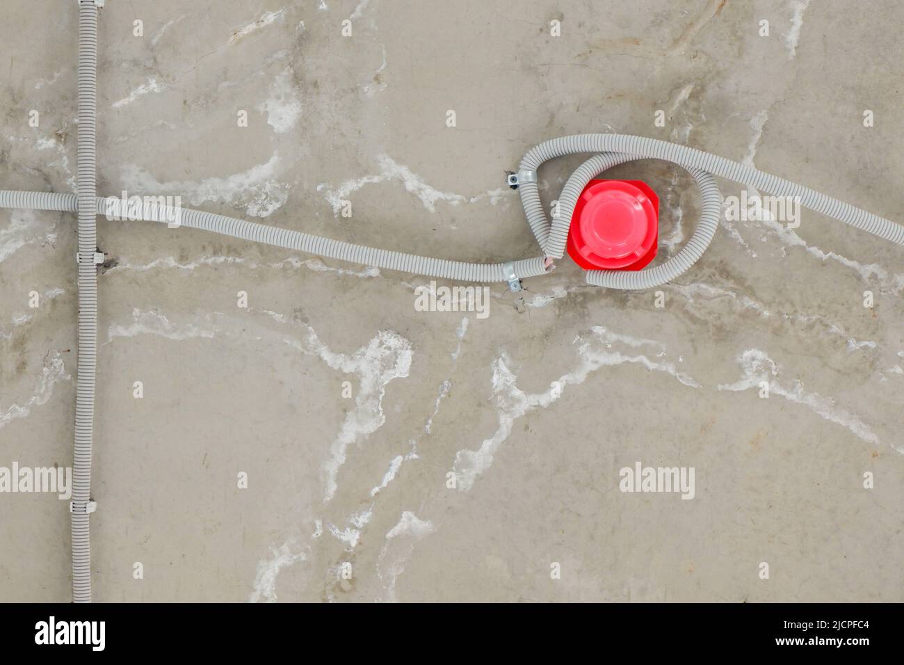 the red fire sensor is mounted on the ceiling during the repair Stock ...