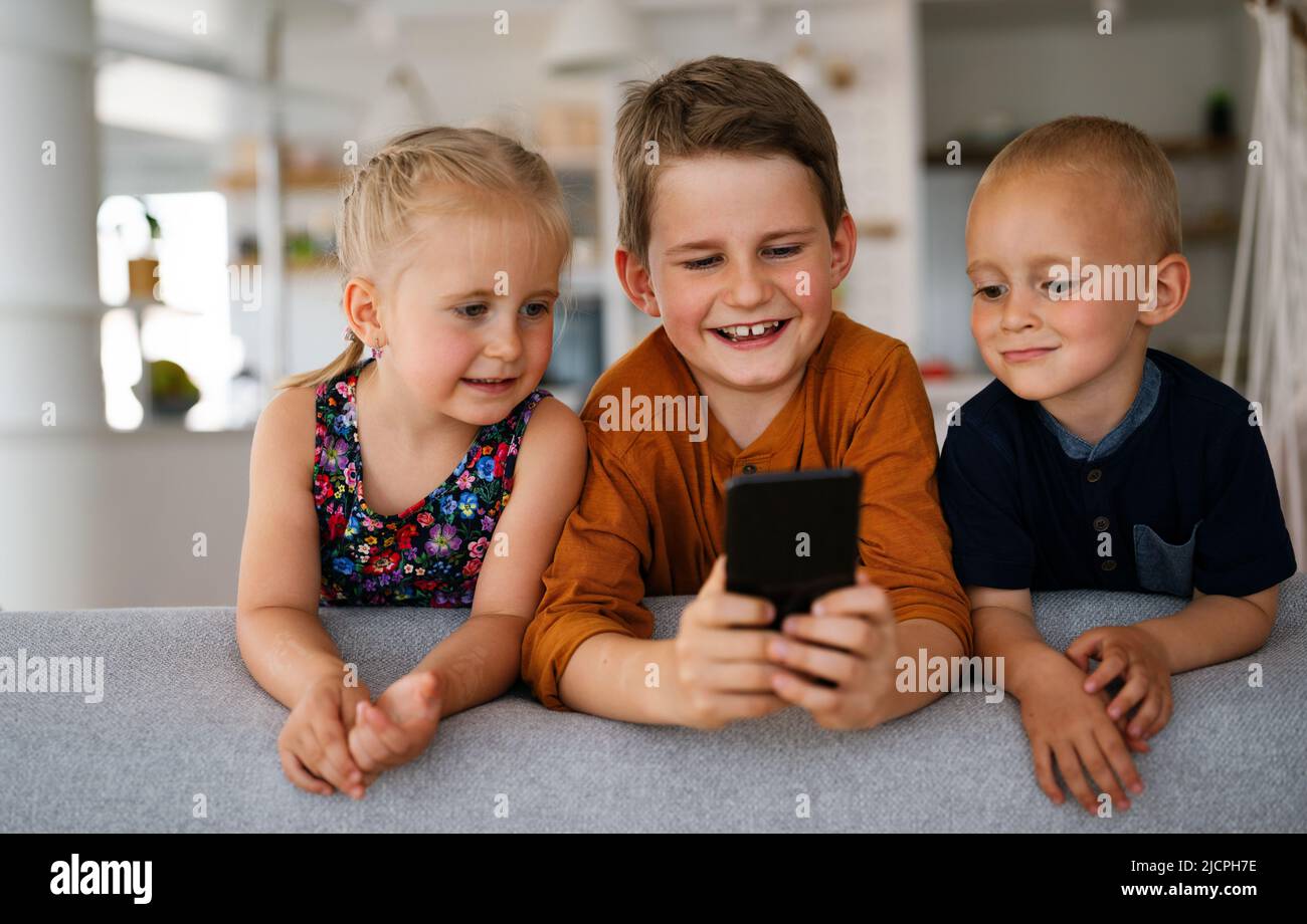 Childhood technology kids smartphone concept. Happy little children ...