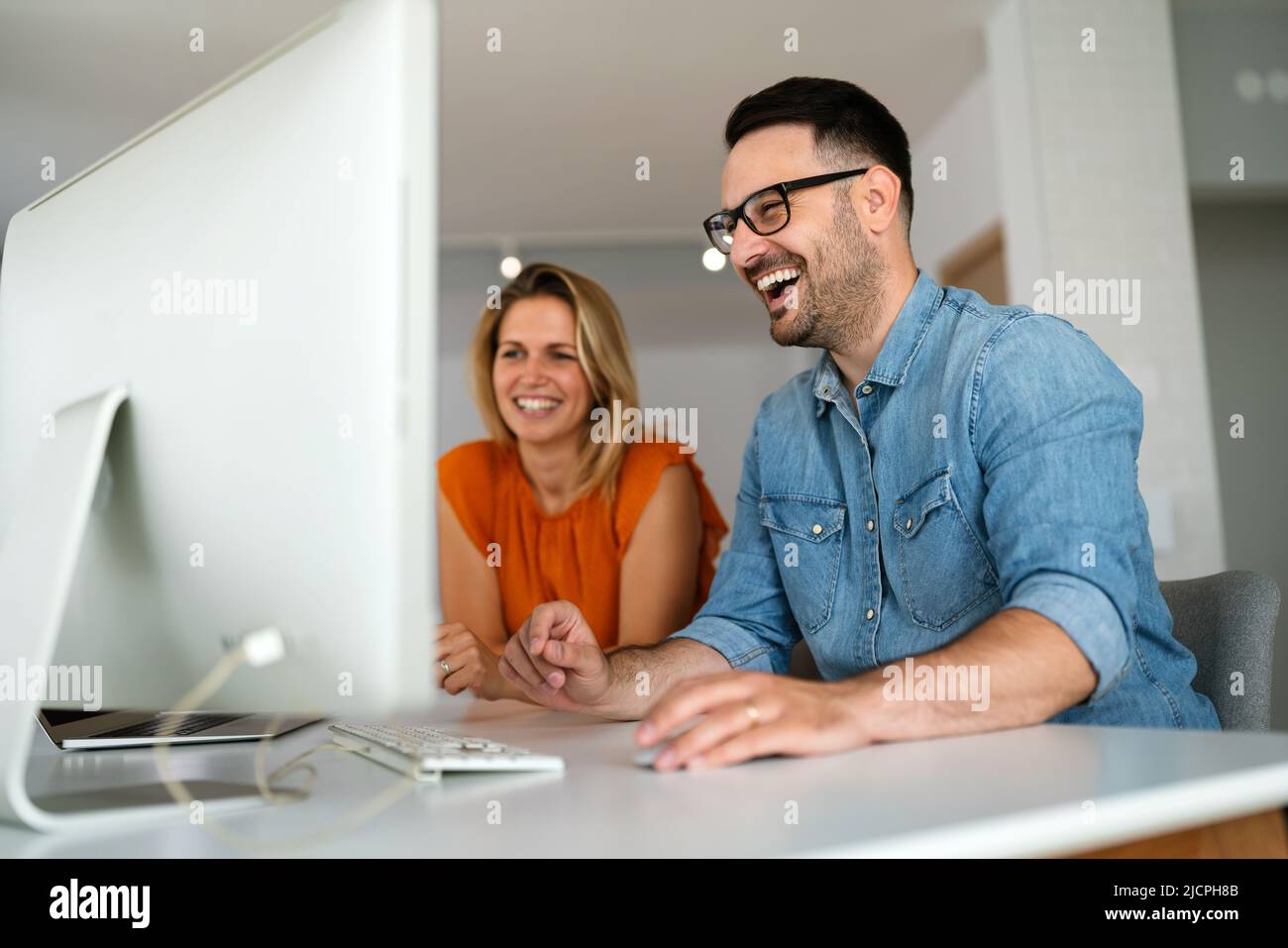 Portrait of success business people working together in home office ...