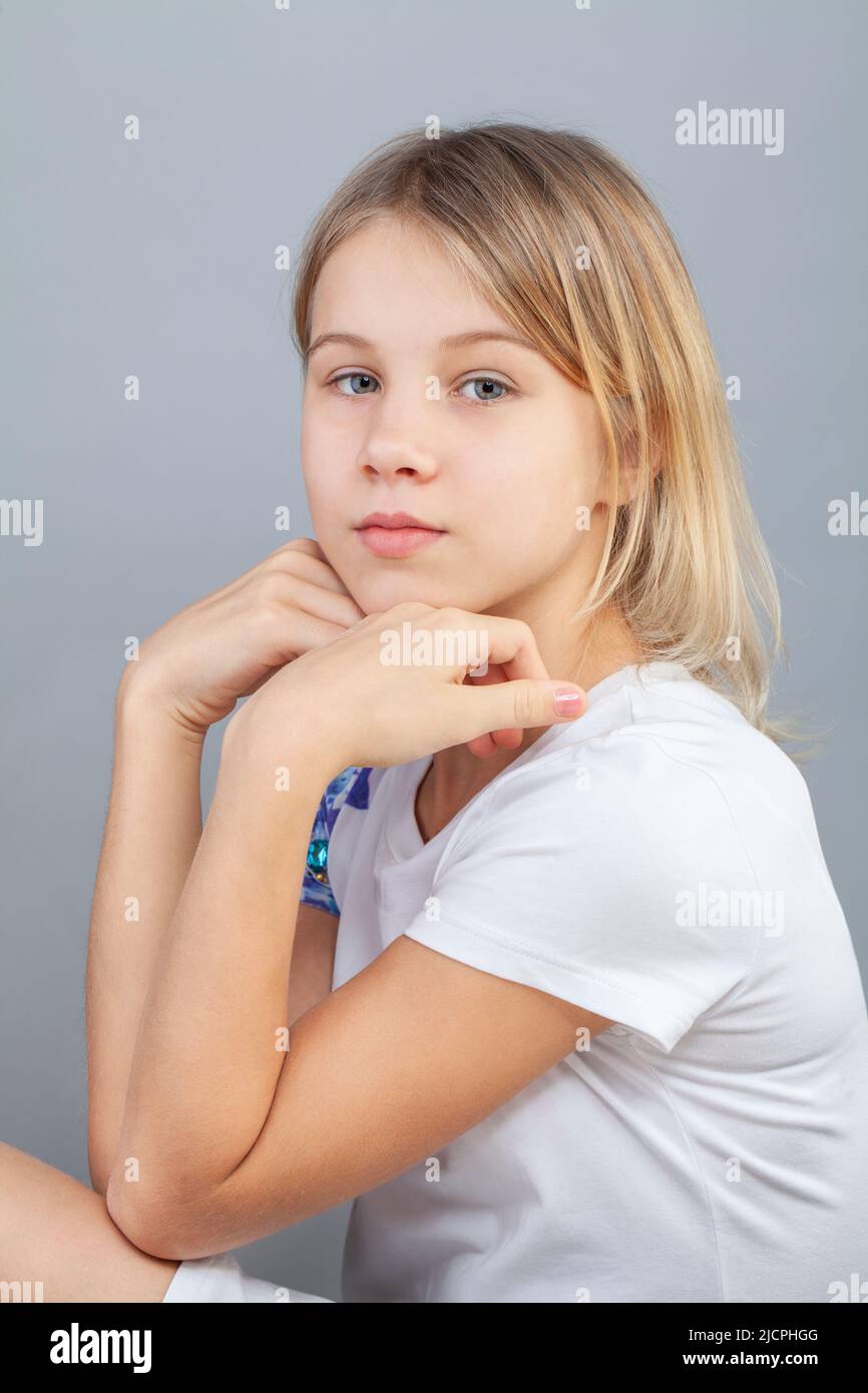 Pretty little girl closeup studio portrait Stock Photo - Alamy