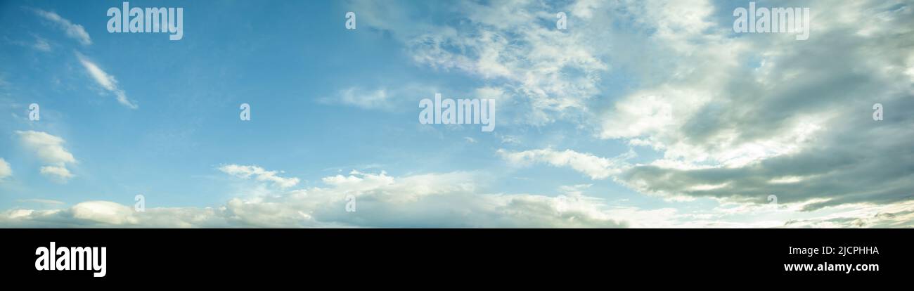 Clear blue sky background, clouds with skyline Stock Photo - Alamy