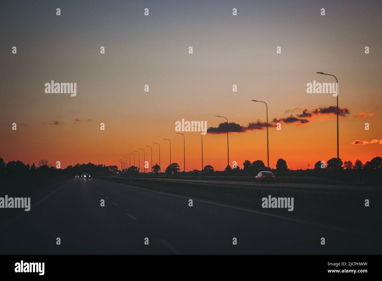 Driving into the sunset hi-res stock photography and images - Alamy