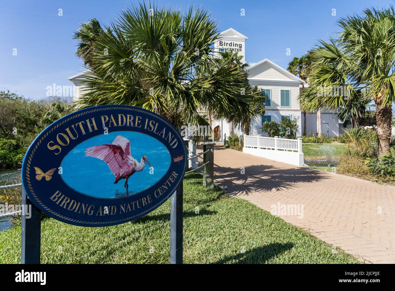 A Roseate Spoonbill on the sign for the South Padre Island Birding and ...
