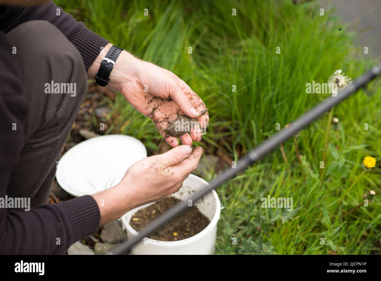 Fisherman baiting hook hi-res stock photography and images - Alamy
