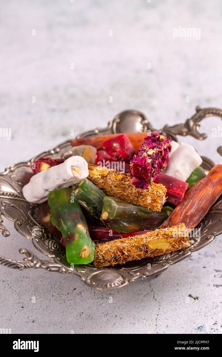 Turkish delight varieties in an iron bowl. Traditional Turkish ...