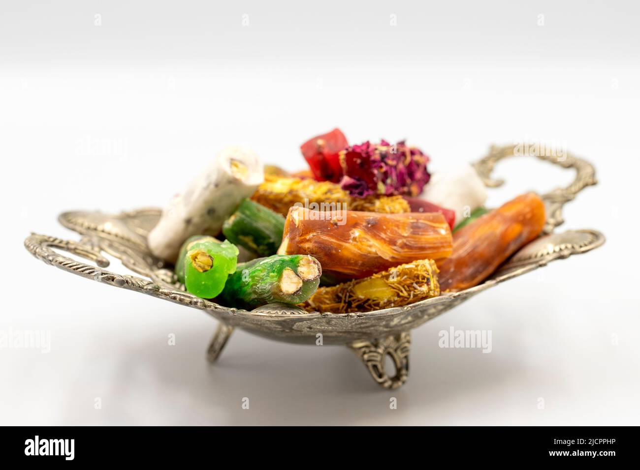 Turkish delight varieties in an iron bowl. Traditional Turkish ...