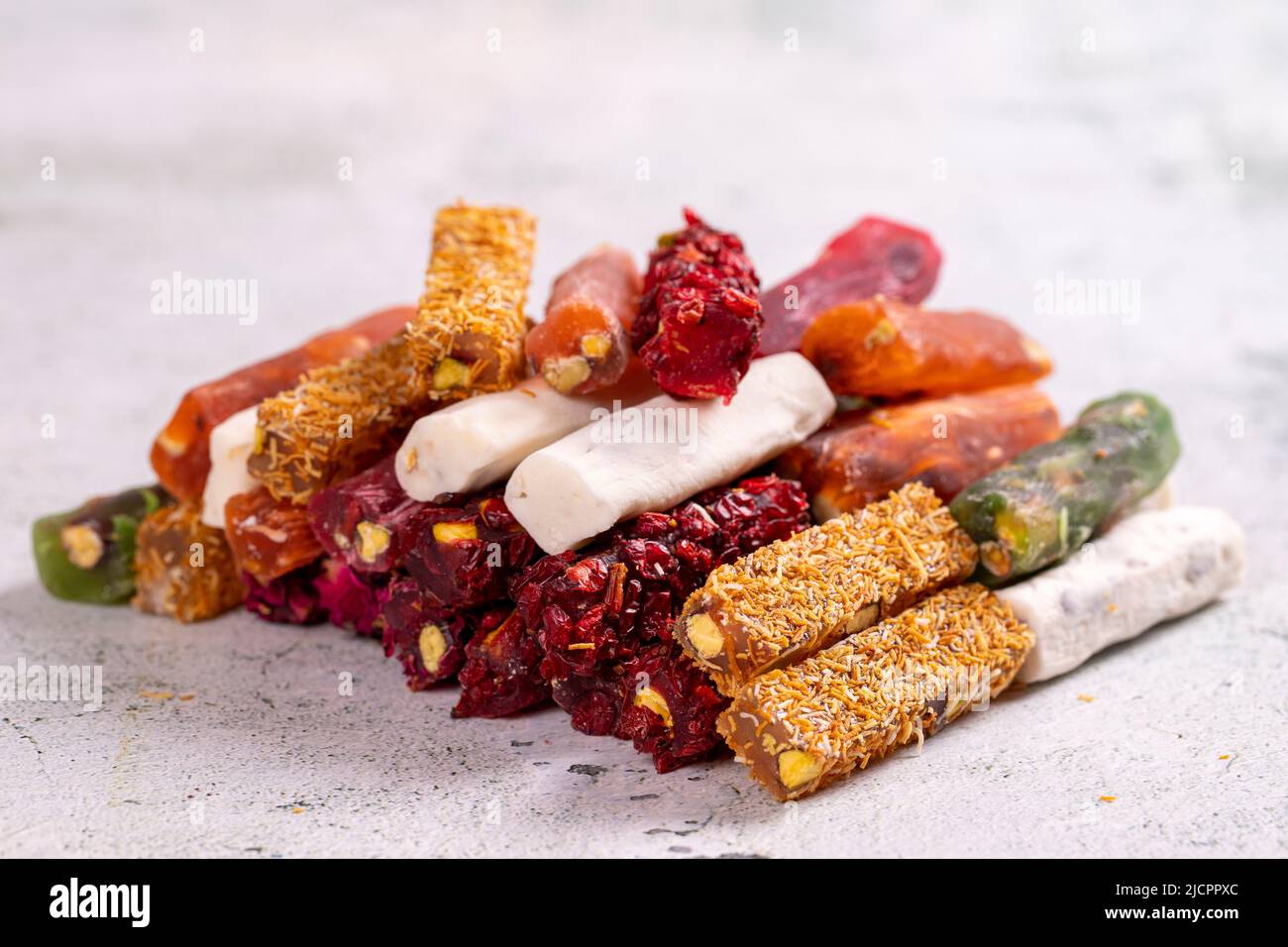 Turkish delight varieties on a concrete floor. Traditional Turkish ...