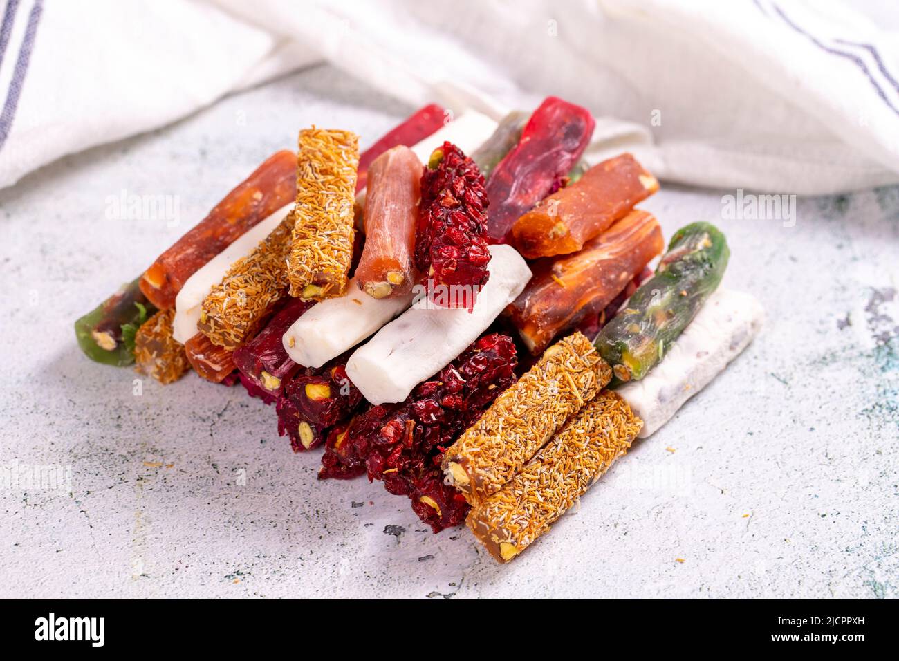 Turkish delight varieties on a concrete floor. Traditional Turkish ...