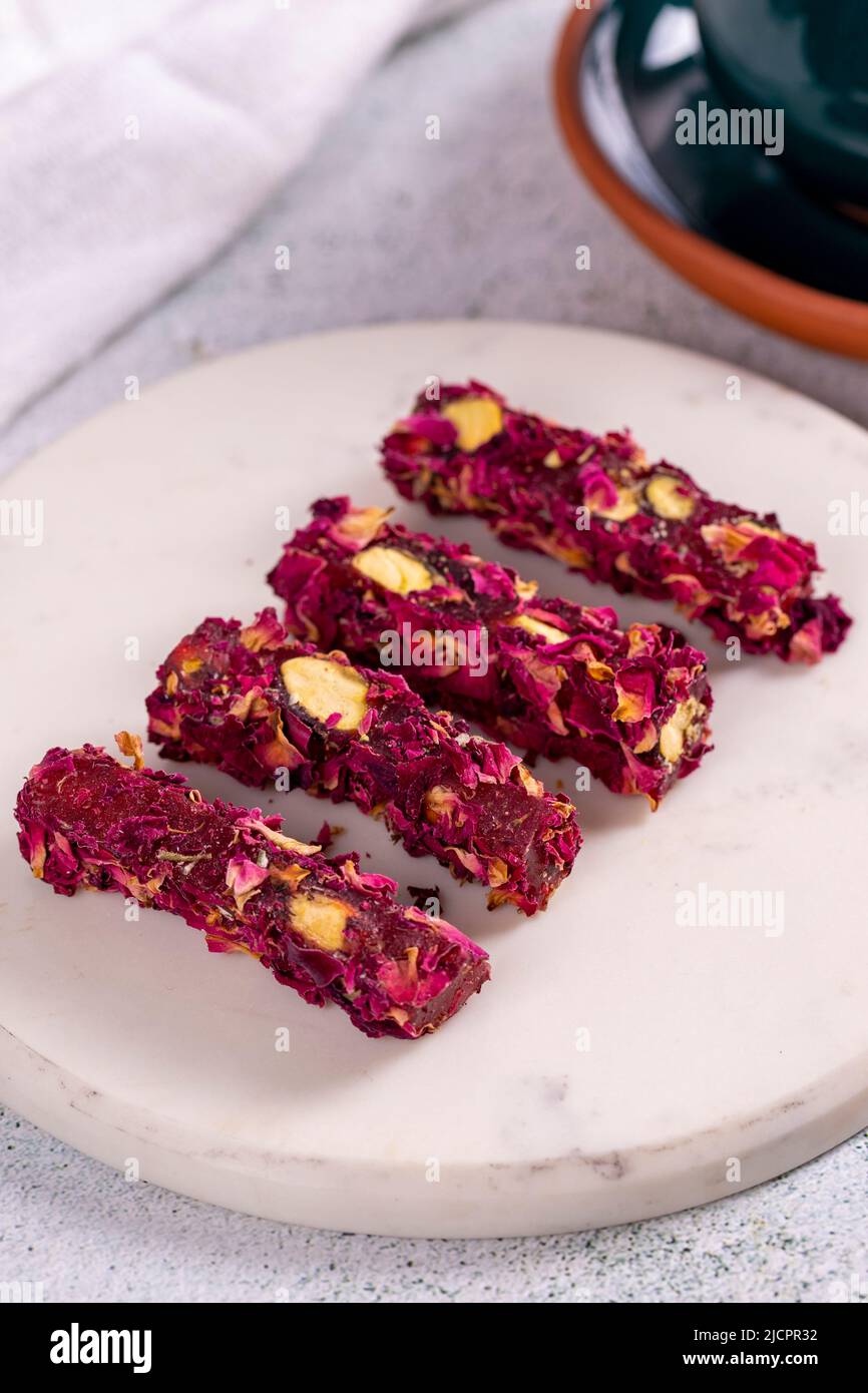 Turkish Delight with Pistachio. Turkish delight with roses on a ...