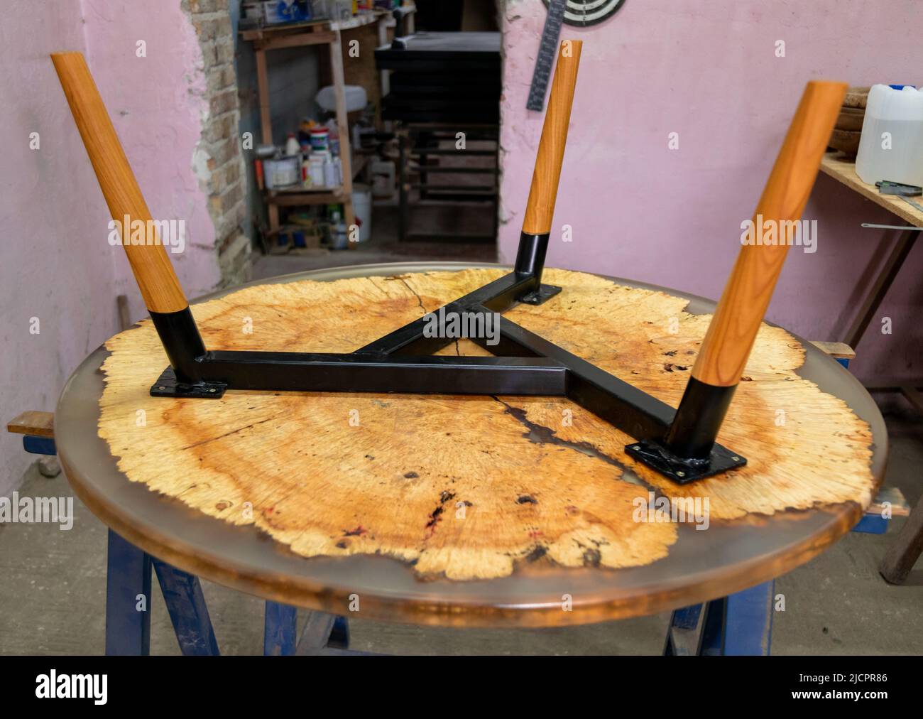 Epoxy resin round table in workshop Stock Photo - Alamy