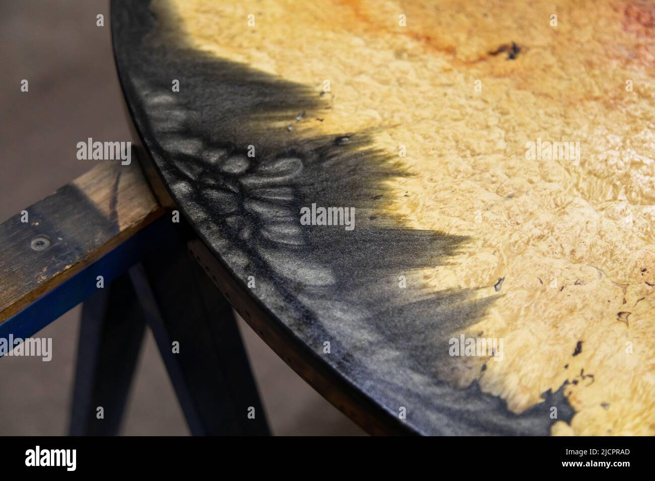 Closeup of epoxy resin round table edge Stock Photo - Alamy