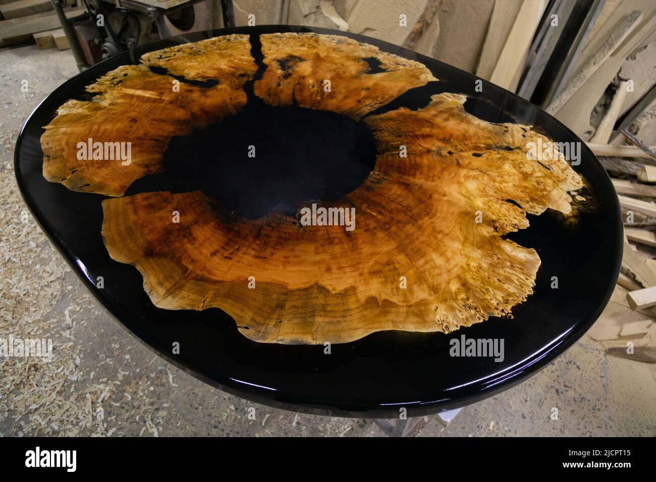Epoxy resin round table in workshop Stock Photo - Alamy