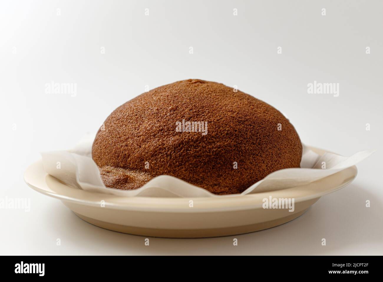 mocha bun on a white background Stock Photo - Alamy