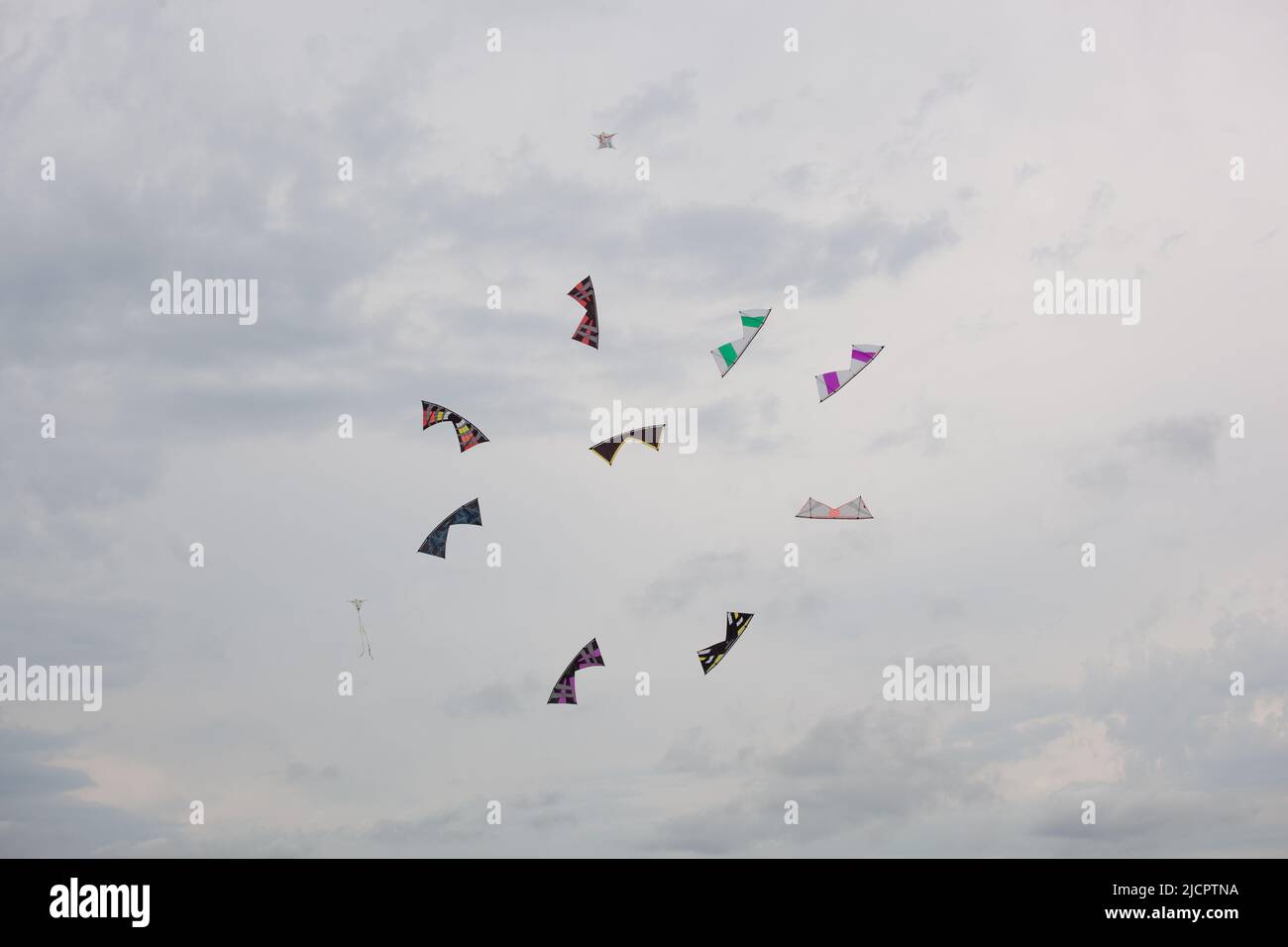 Nine individual kites follow each other in a perfect ballet Stock Photo ...