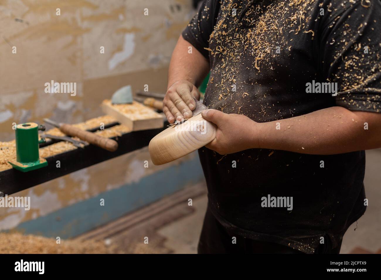 Closeup of person sanding wooden product using sandpaper Stock Photo ...