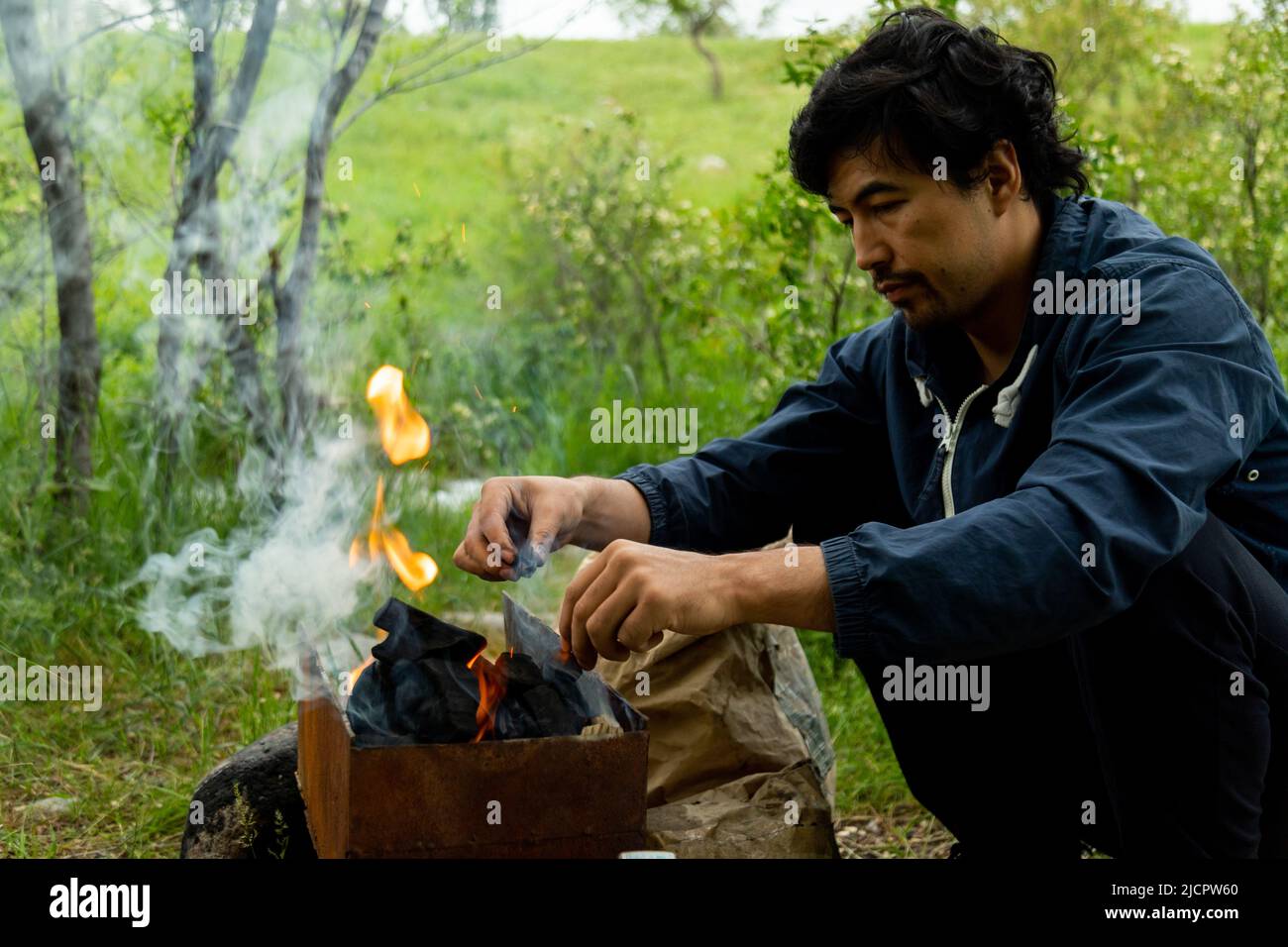 Lighting a fire hi-res stock photography and images - Alamy