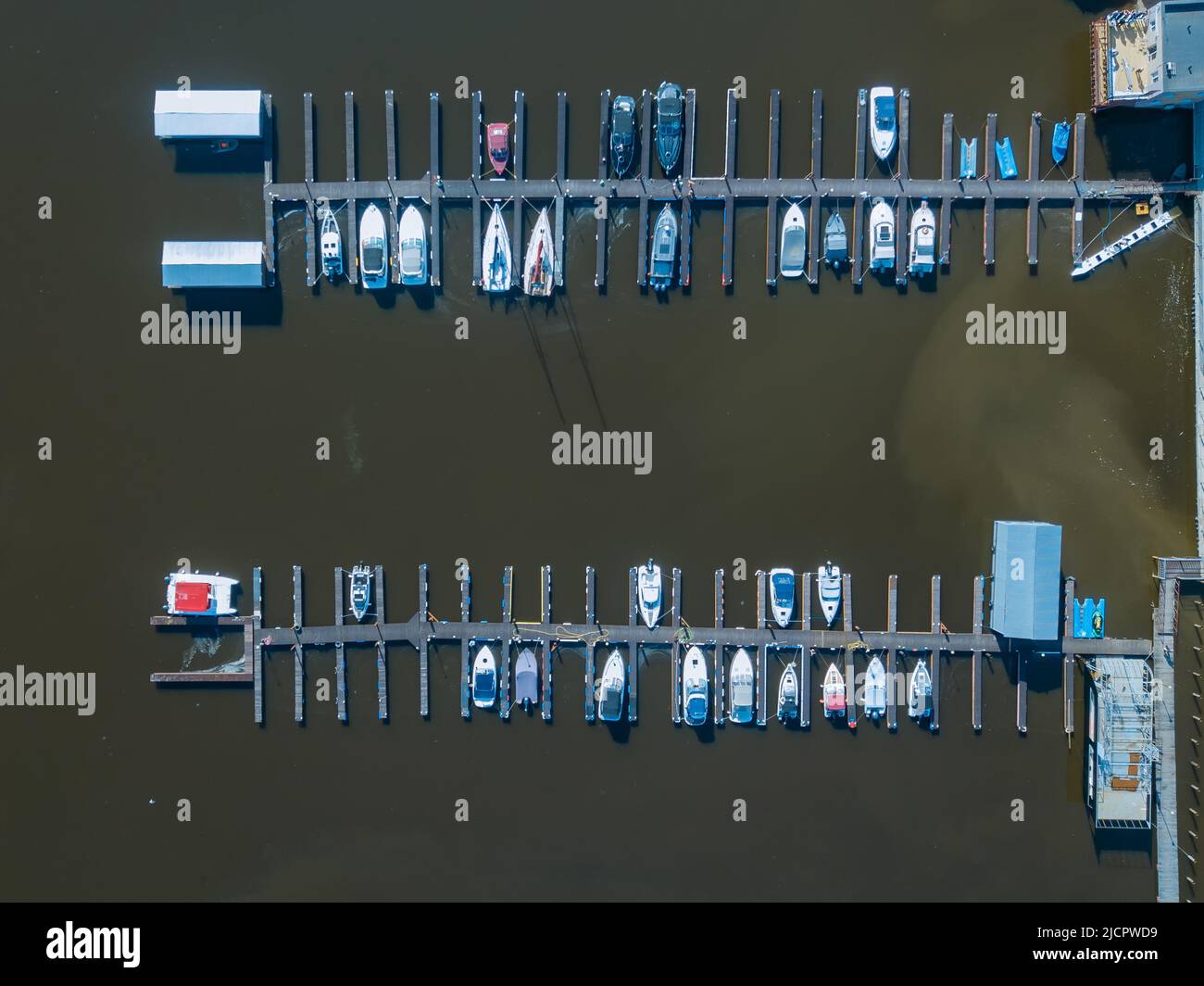 Boat and yacht parking. A marina lot. Yacht and sailboat is moored at ...