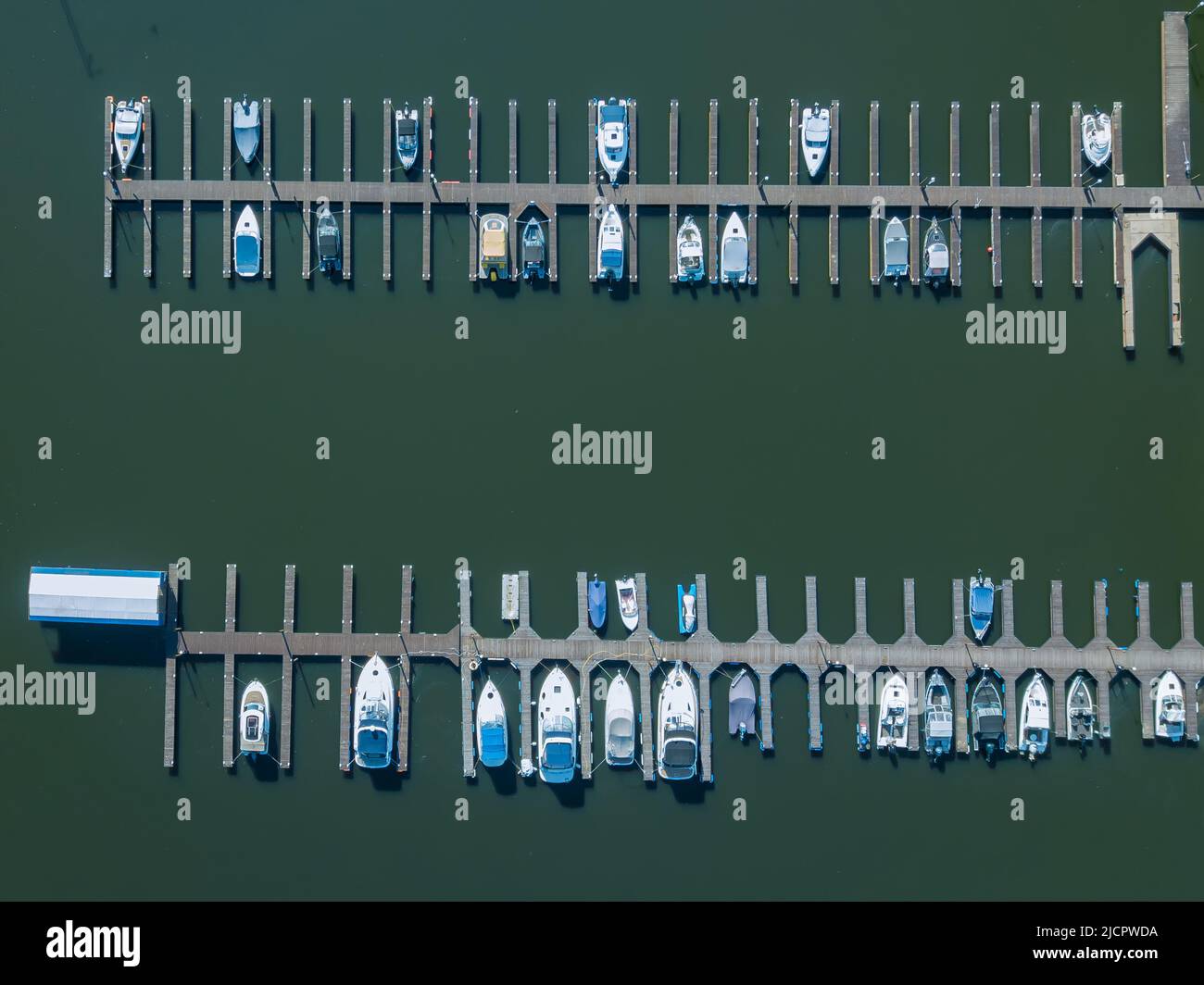 Boat and yacht parking. A marina lot. Yacht and sailboat is moored at ...