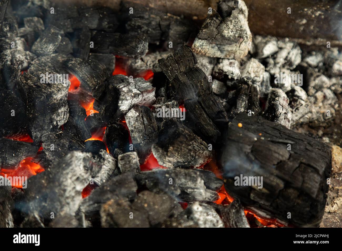 Closeup of flaming charcoal in the brazier Stock Photo - Alamy