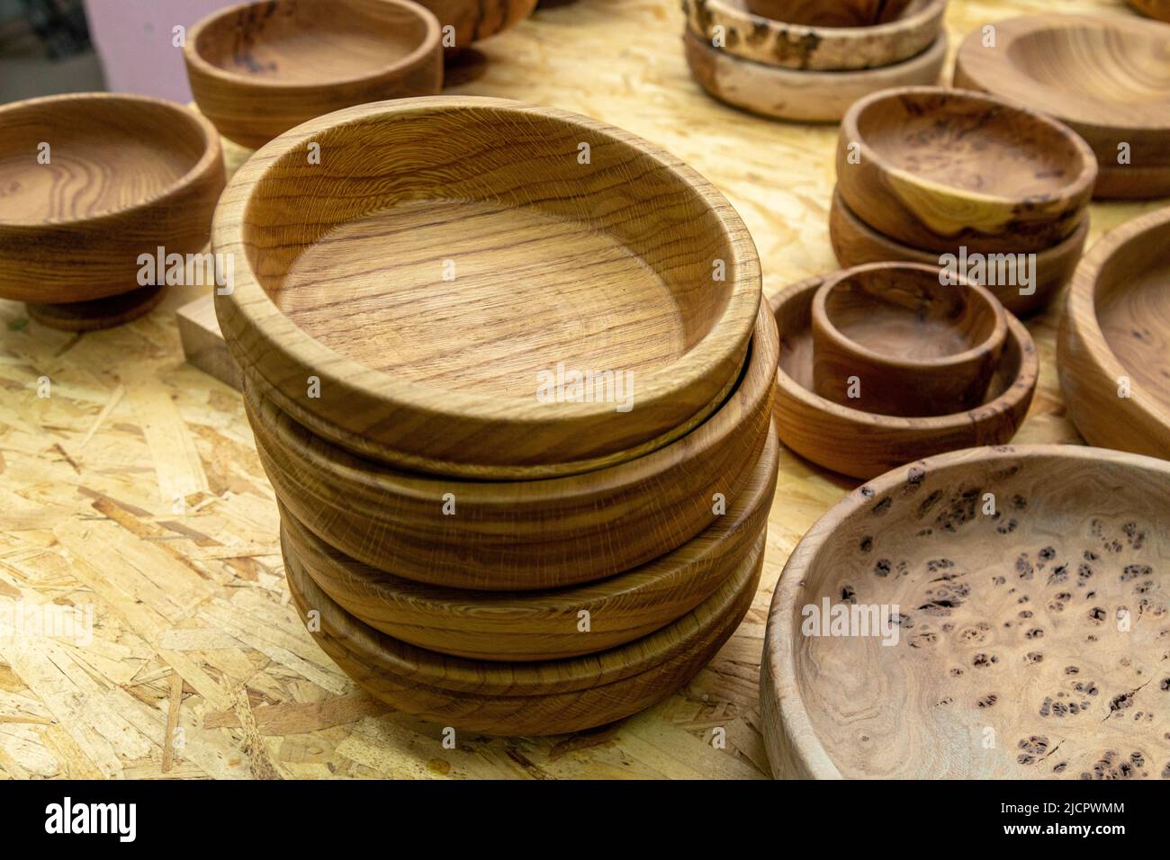 Handmade wooden bowls on a table Stock Photo - Alamy