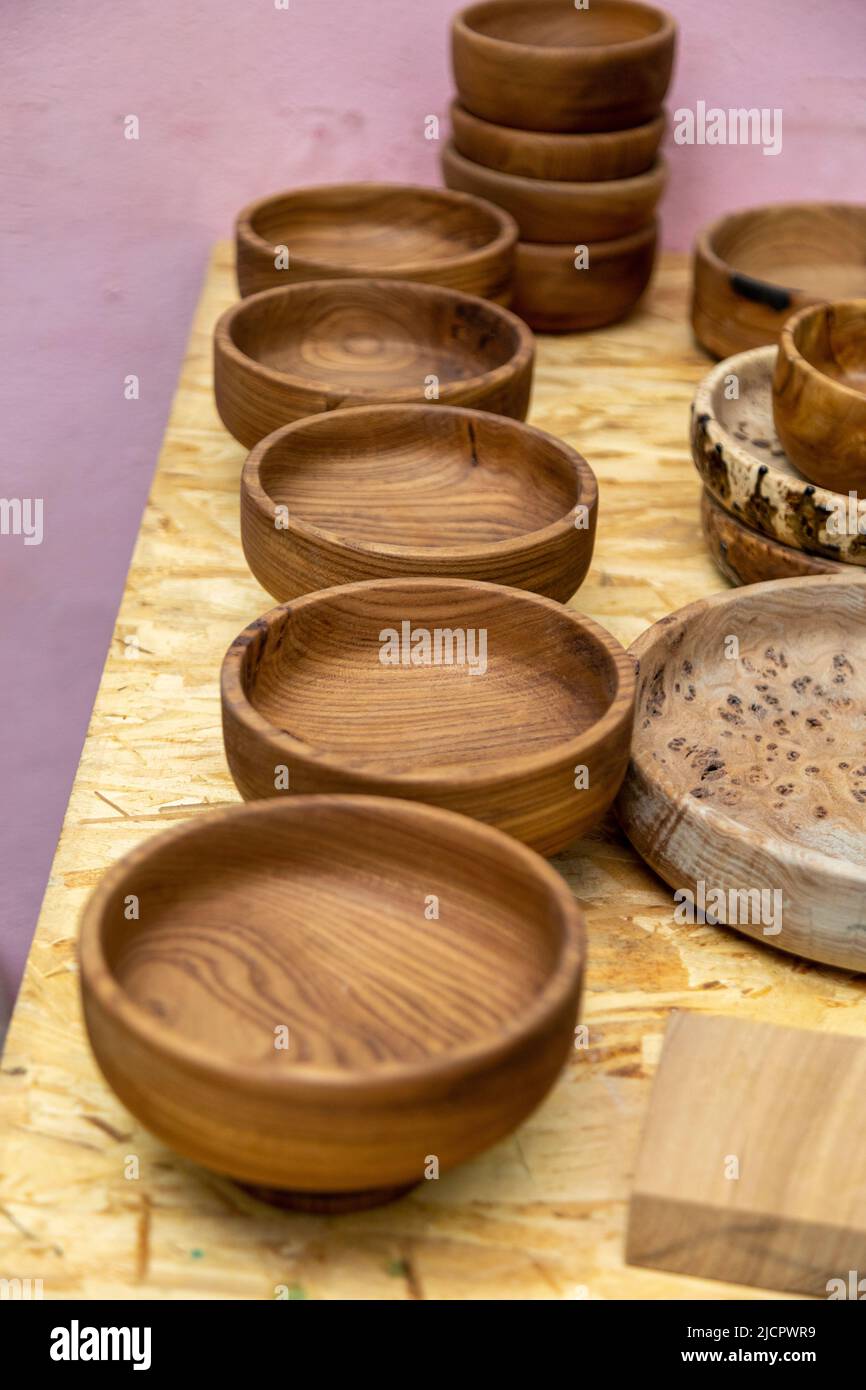 Handmade wooden bowls on a table Stock Photo - Alamy