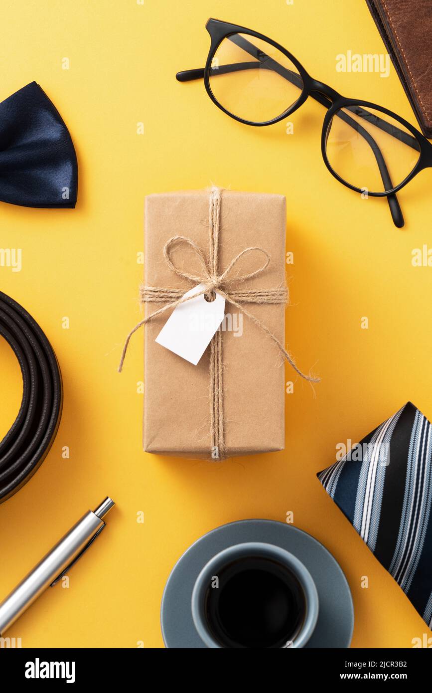 Father's day gift idea design concept with gift box on yellow ...