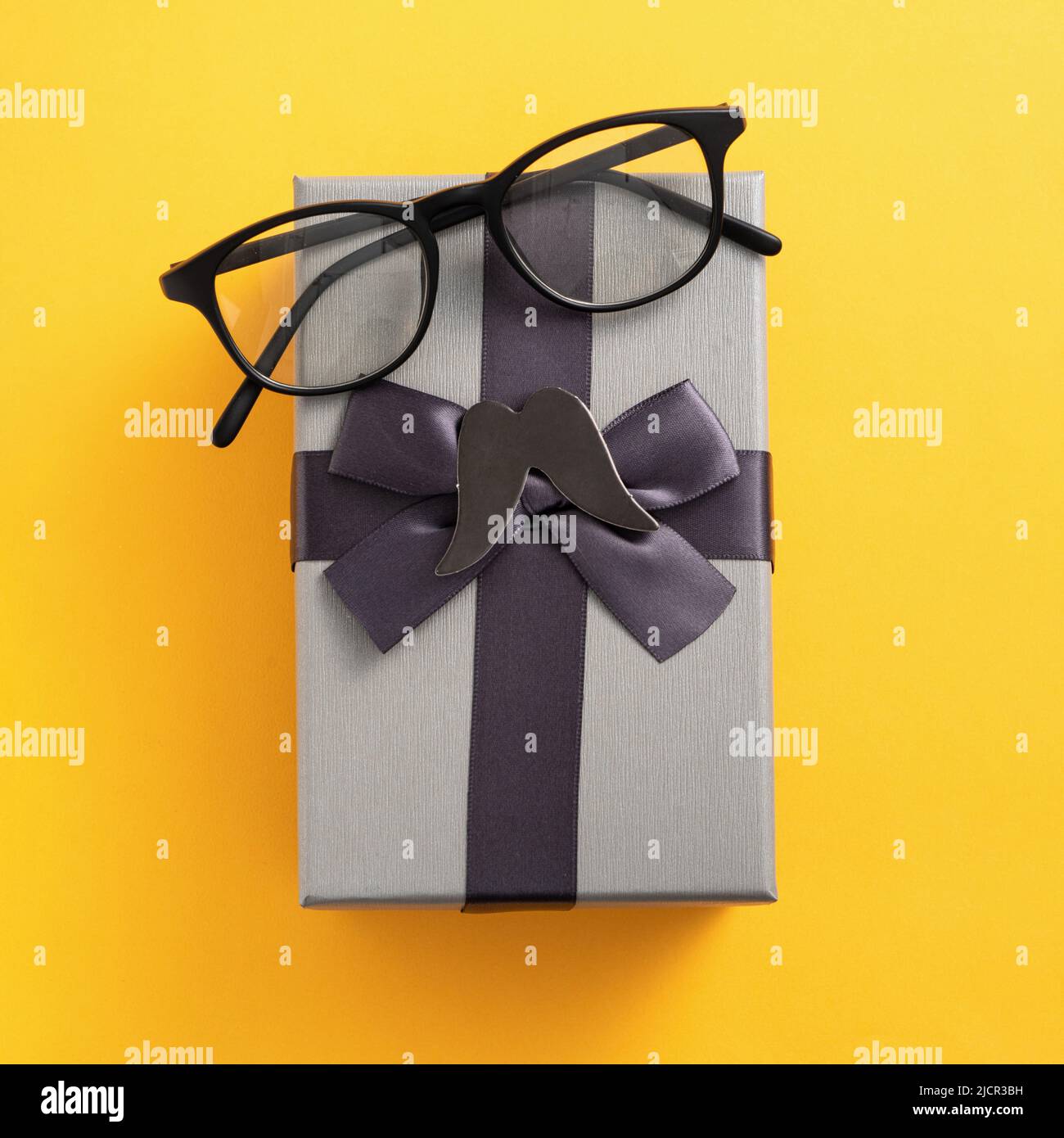 Father's day gift idea design concept with gift box on yellow ...