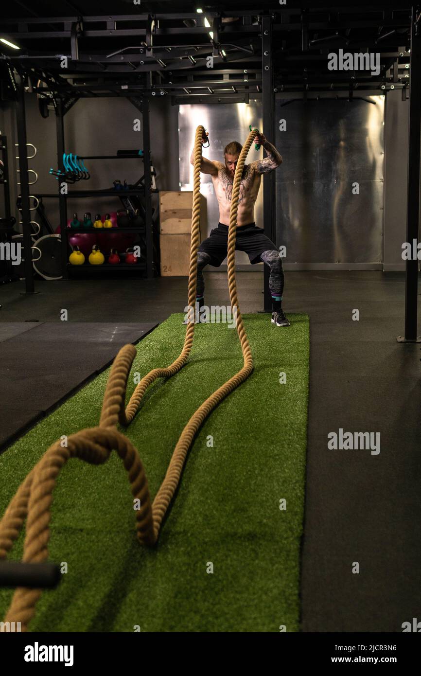 Rope warehouse fitness green man grass training gym muscular young, for ...