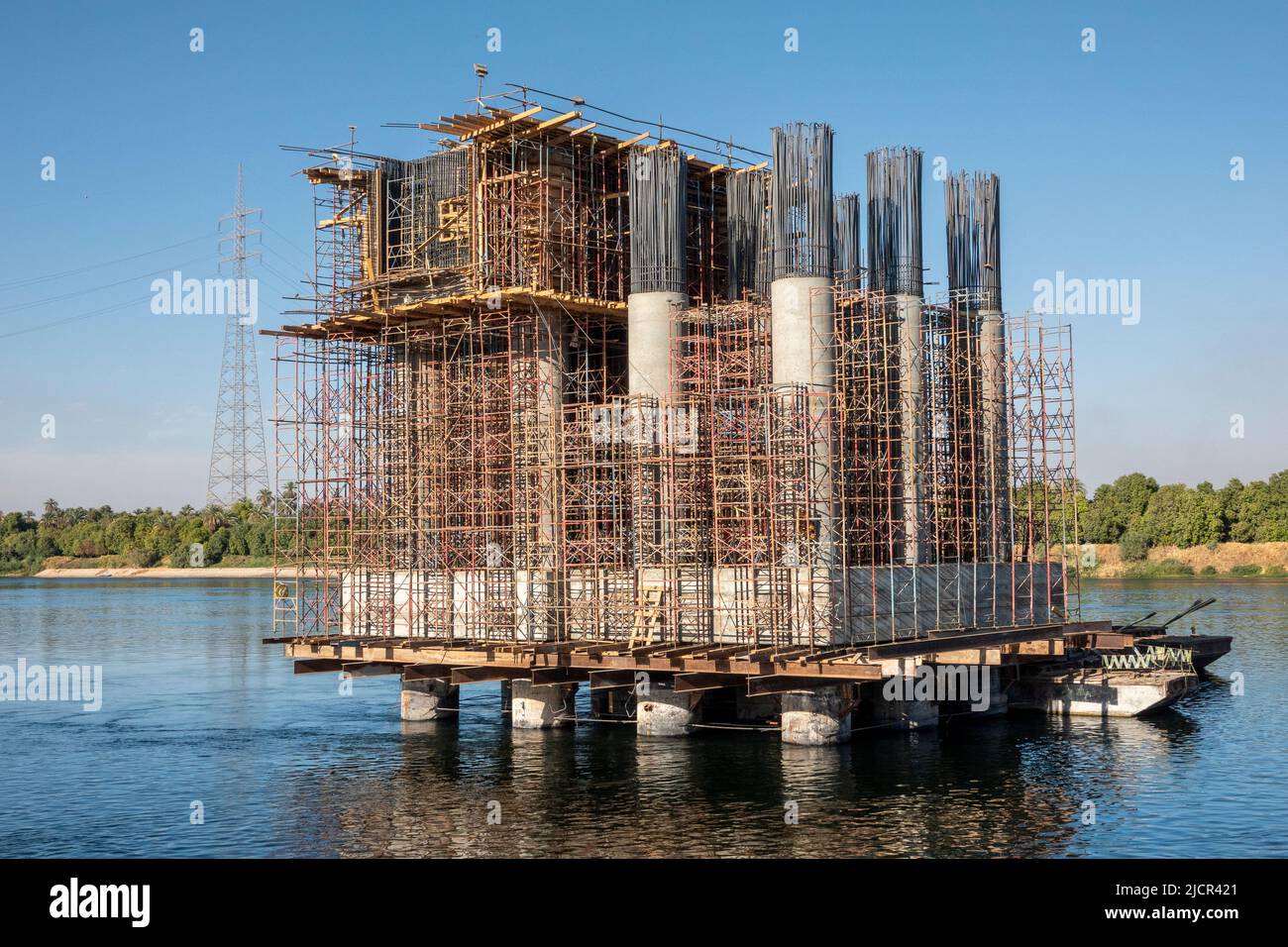 Bridge construction on the river Nile showing scaffolding and concrete ...