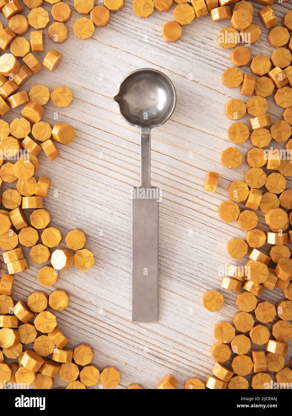 Gold metal granules hi-res stock photography and images - Alamy