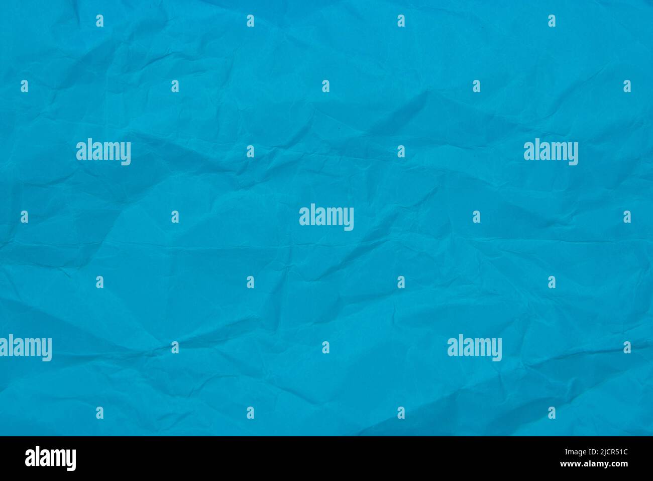 Crumpled blue paper craft textured background Stock Photo - Alamy