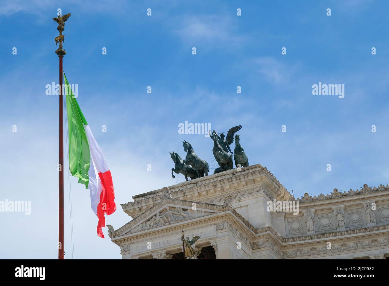 Italian Flag flies in front of the Monument Vittoriano at Piazza ...
