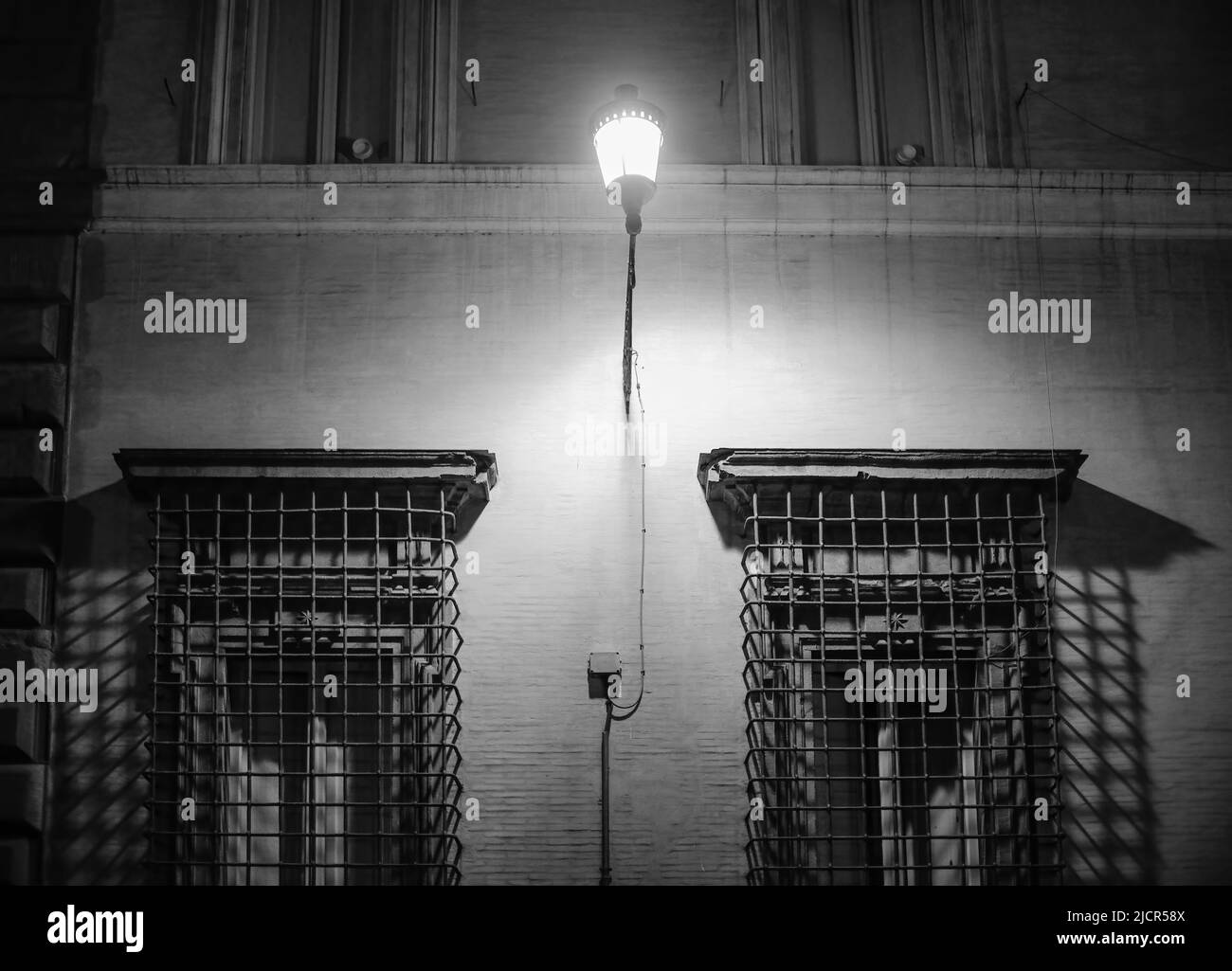 Barred window in white wall hi-res stock photography and images - Alamy