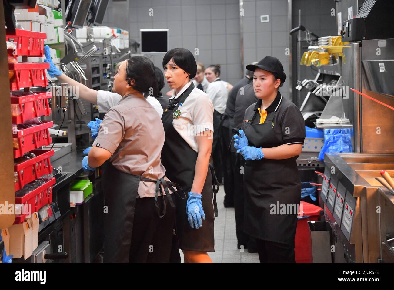 Moscow. The staff of the fast food restaurant of new network 'Tasty ...