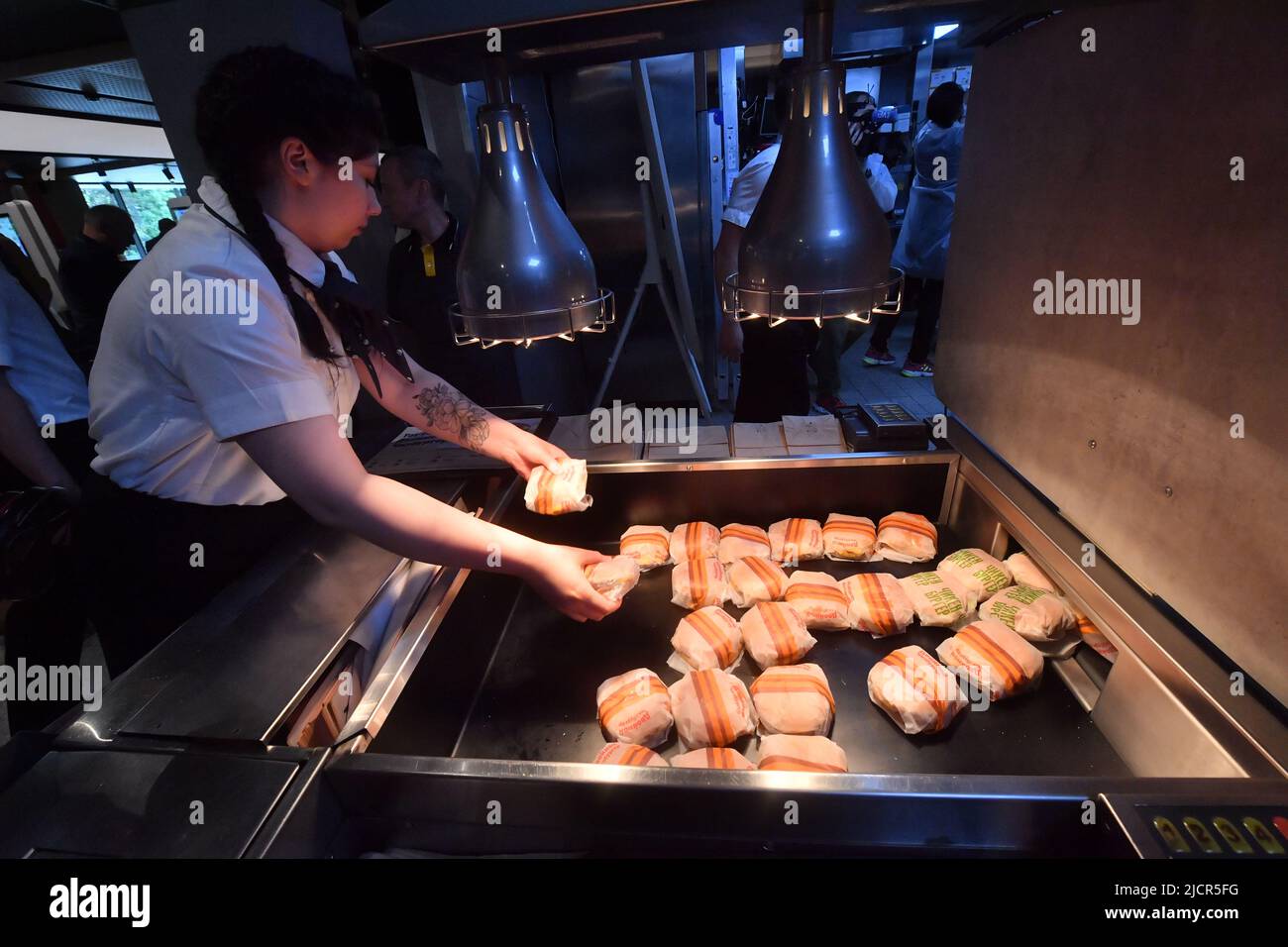Moscow. The employee of the fast food restaurant of new network 'Tasty ...