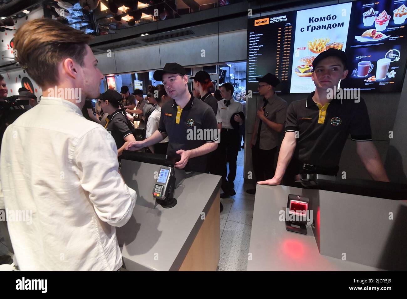 Moscow. The staff of the fast food restaurant of new network 'Tasty ...
