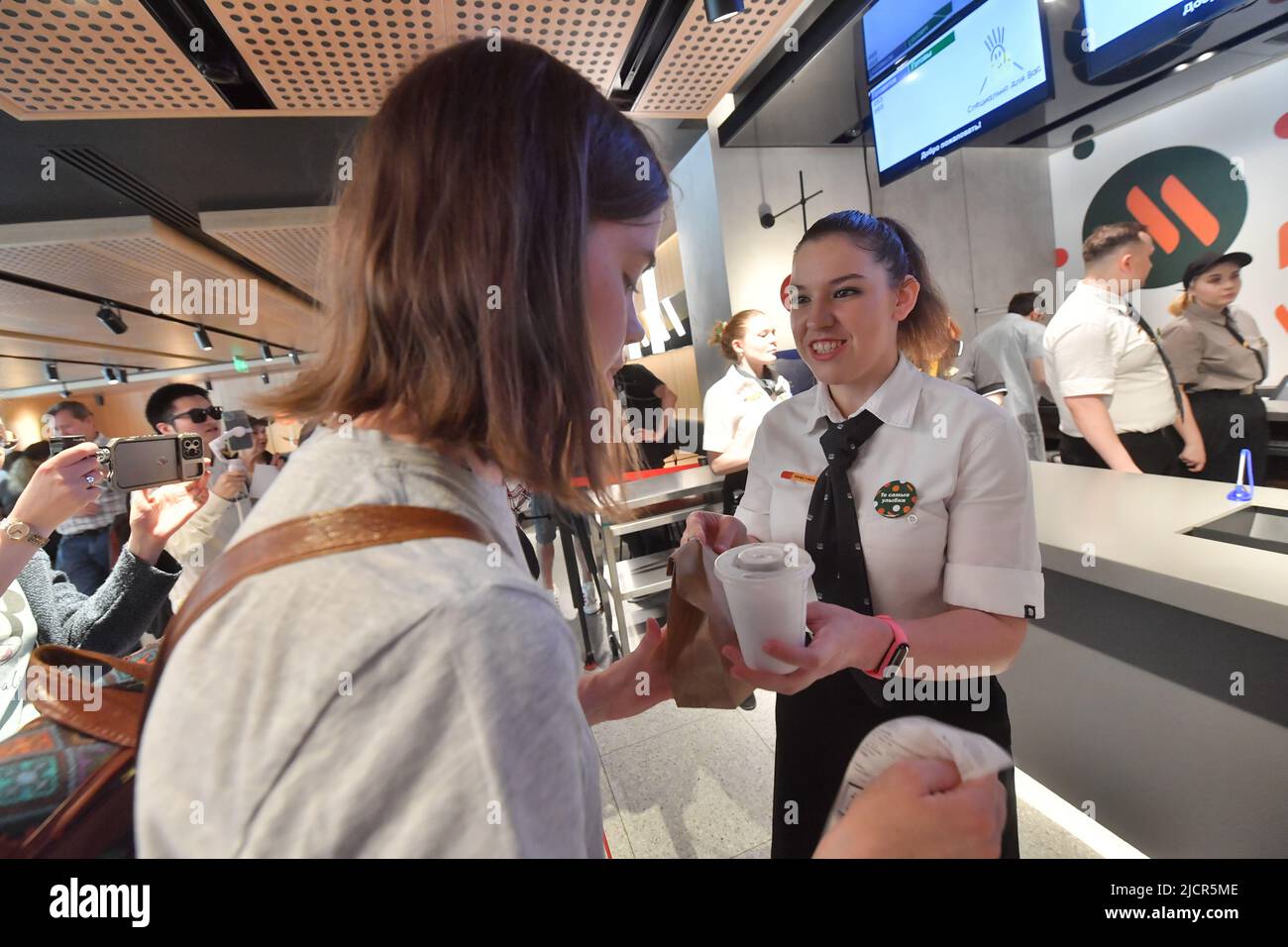 Moscow. The staff of the fast food restaurant of new network 'Tasty ...