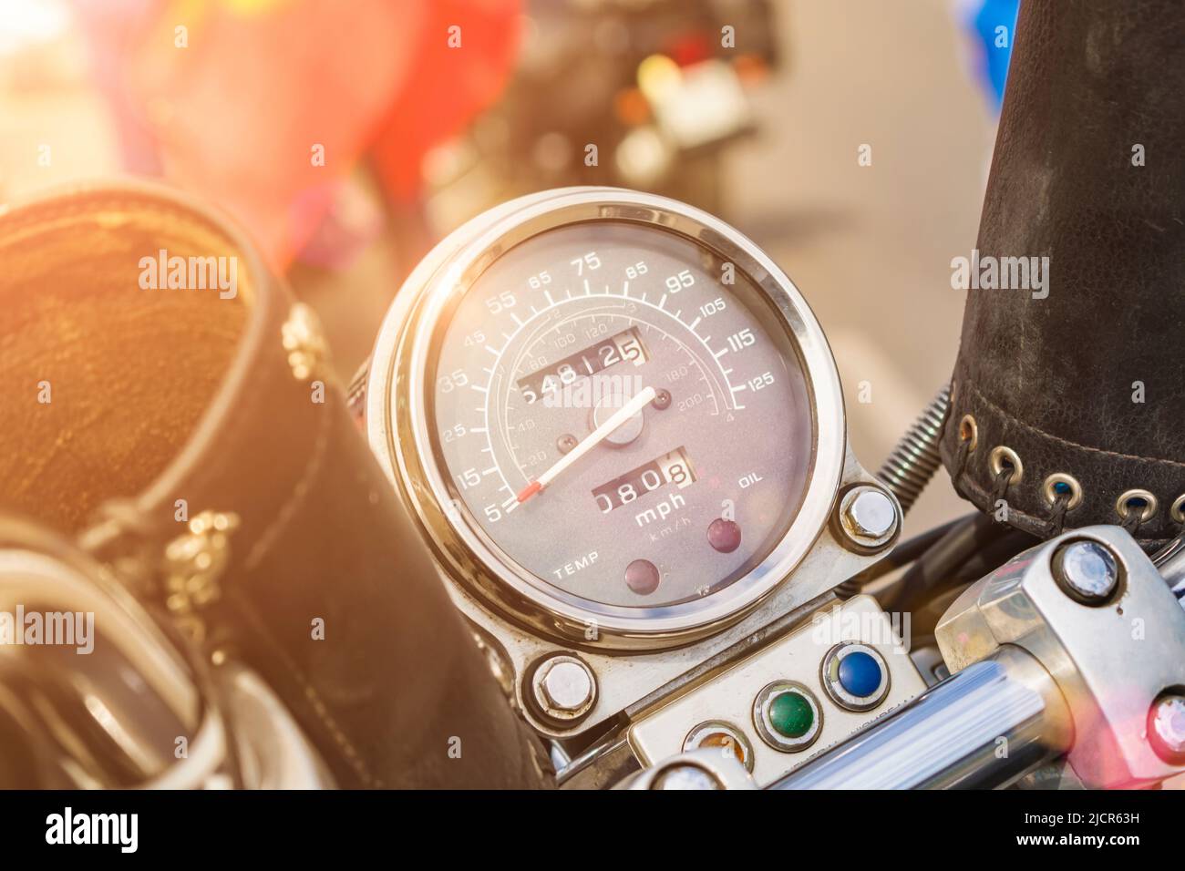Analog speedometer of a powerful motorcycle in a shiny finish close-up ...
