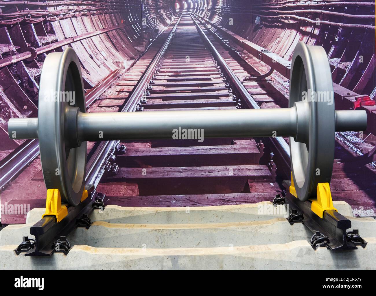 Railway wheels with a photo of mining gallery tunnel with railway, at ...