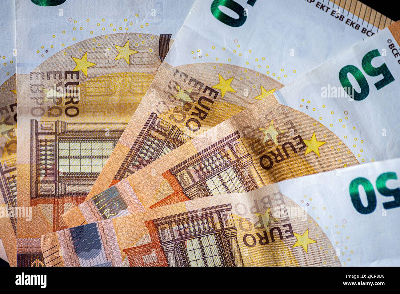 50 euro banknotes on a black background Stock Photo - Alamy