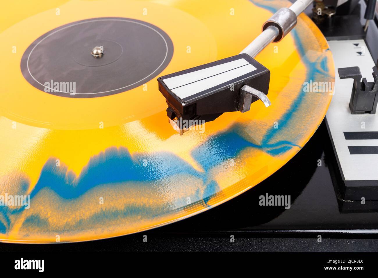 Close up of turntable needle on a vinyl record. Turntable playing vinyl ...