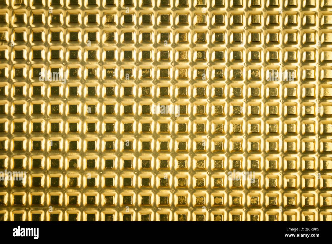 Golden plastic packaging food tray texture background Stock Photo - Alamy